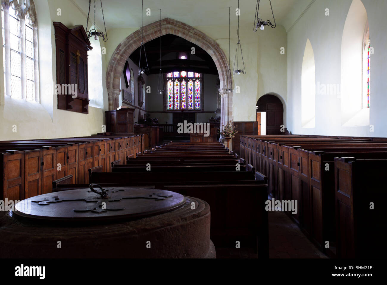 The charming Nave inside the idyllic St Andrew`s Church at Wroxeter in ...