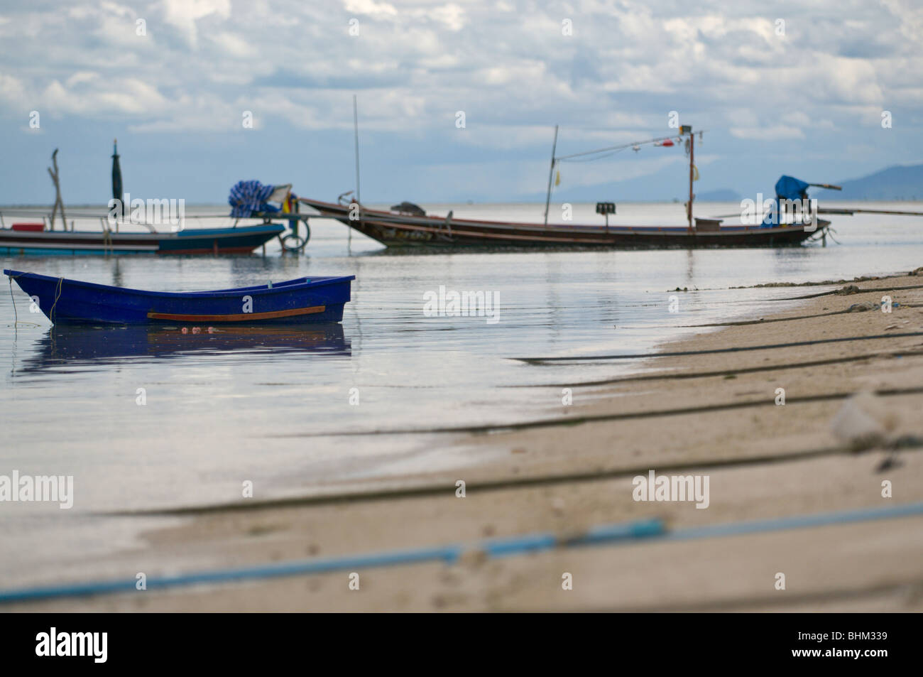 Local Thai fishing boats moored on the beach, Koh Samui Stock Photo - Alamy
