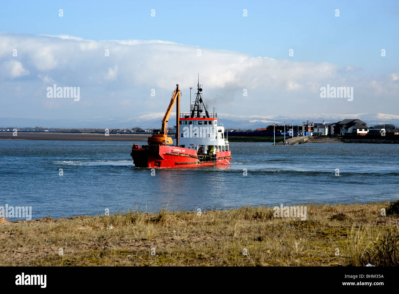The grab hopper dredger "Admiral Day" on its way out to sea, in ...