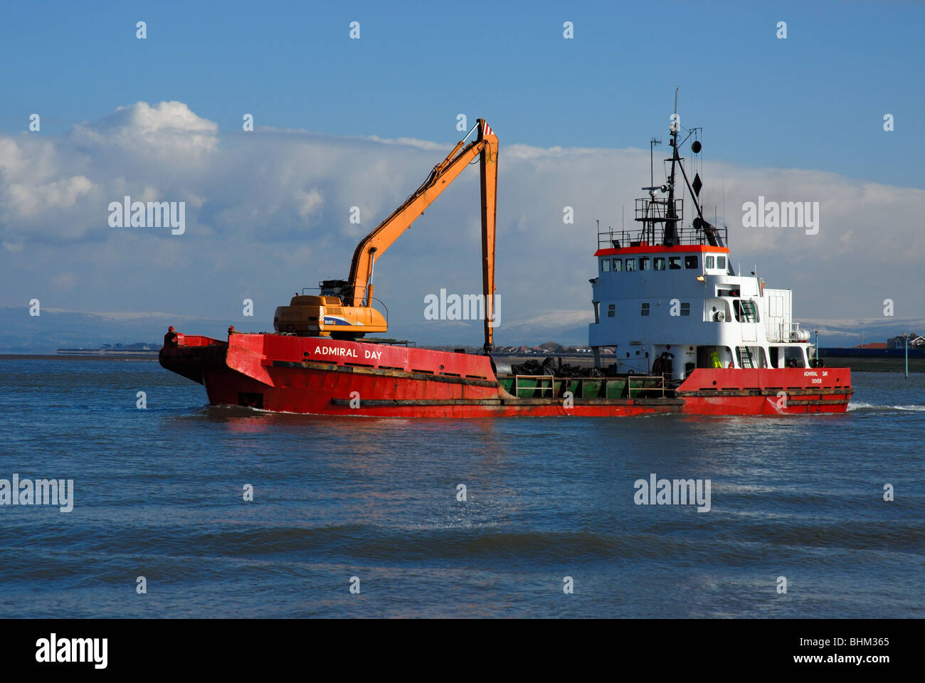 The grab hopper dredger "Admiral Day" on its way out to sea, in ...