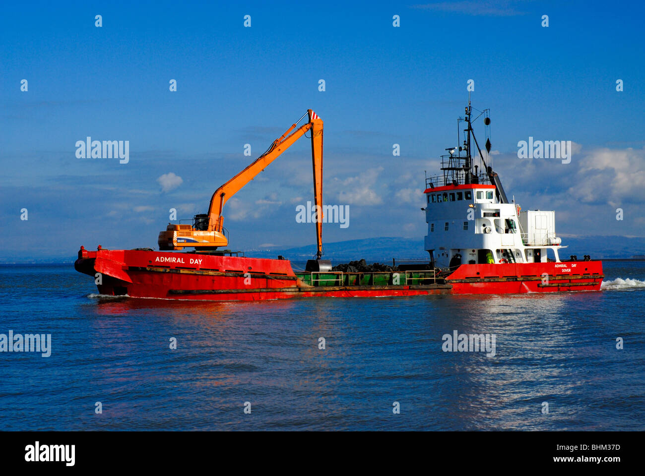 The grab hopper dredger "Admiral Day" on its way out to sea, in ...