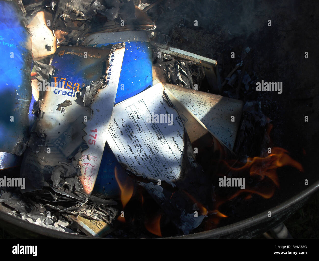 Burning bank's and credit card companies's advertisements and other ...