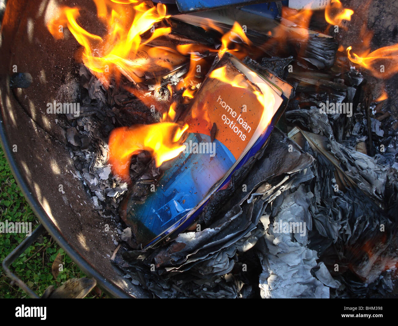 Burning bank's and credit card companies's advertisements and other ...