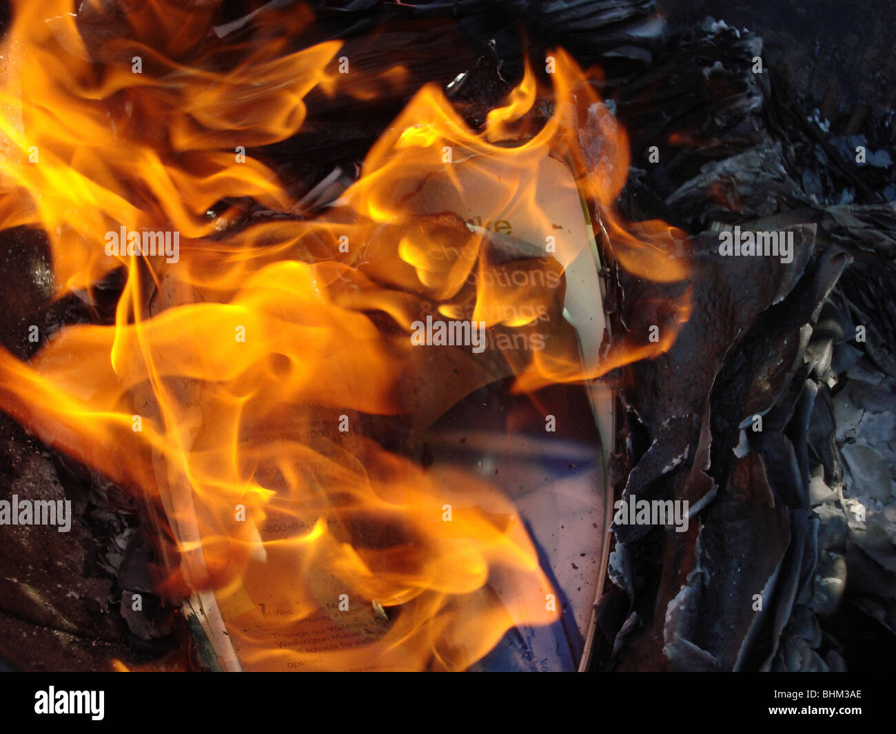 Burning bank's and credit card companies's advertisements and other ...