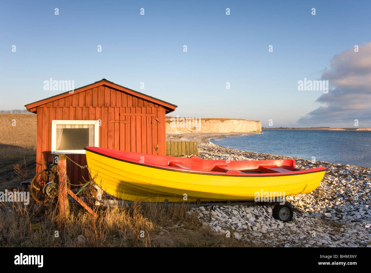 Boat and shed on the beach Stock Photo - Alamy