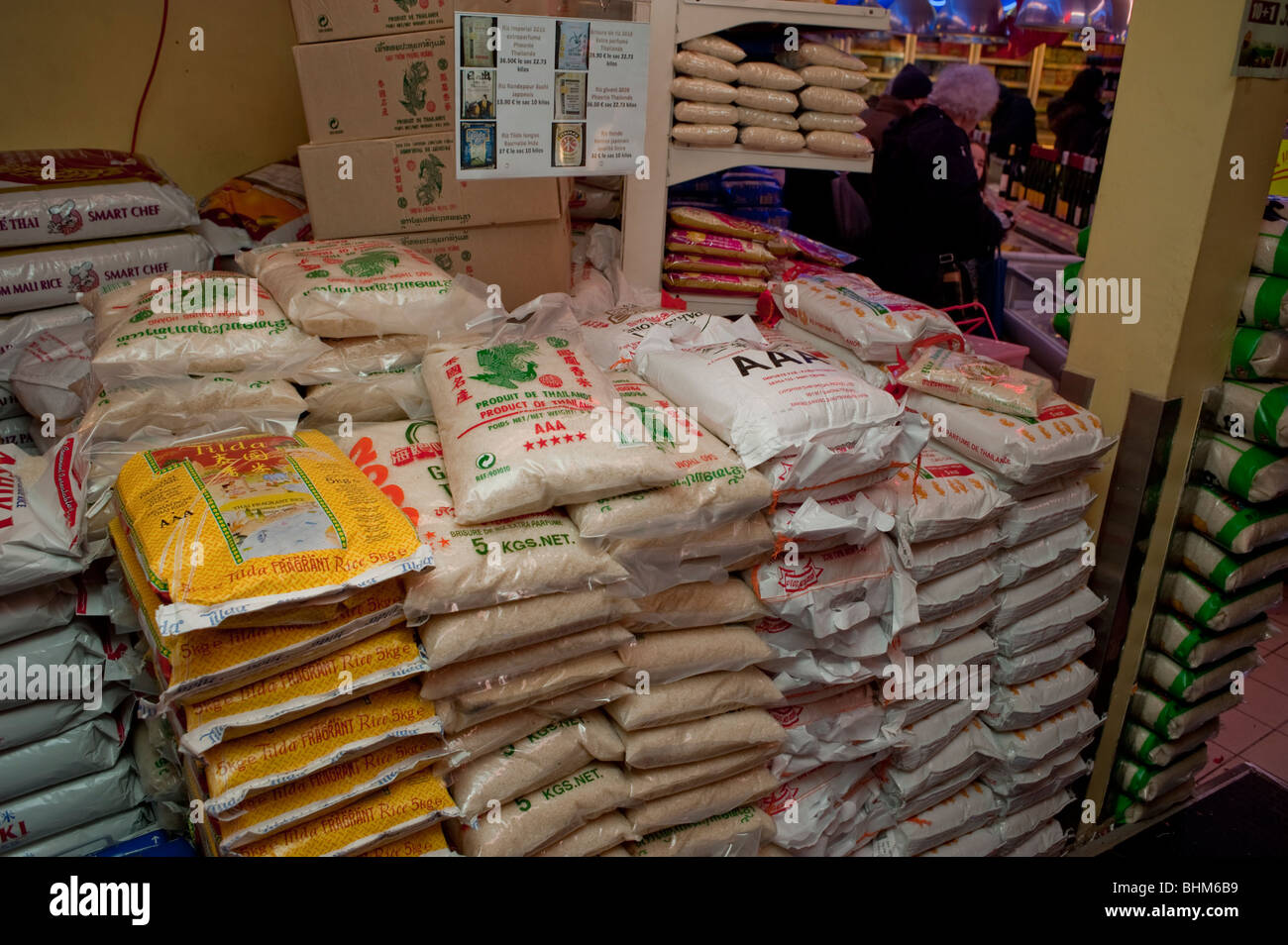 Paris, France, Sacks of Imported Rice piled up on floor of Chinese ...