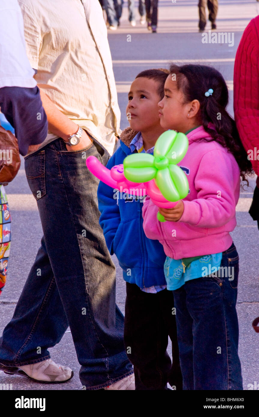 Children with balloon hi-res stock photography and images - Alamy