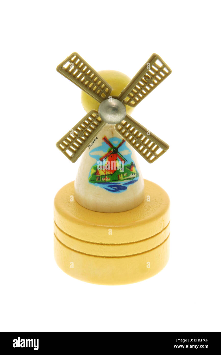 Miniature wooden windmill souvenir on white background Stock Photo - Alamy