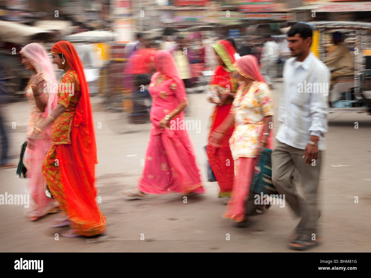 Colourfully clad Rajput women head for the Sardar Bazaar in the centre ...