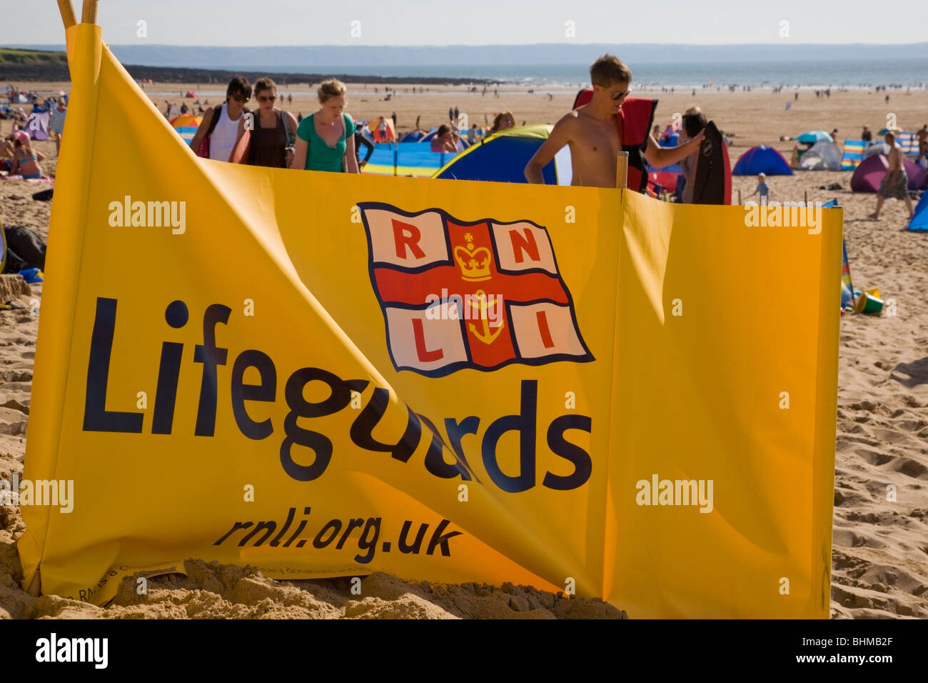 Lifeguard flag on the beach at Croyde Bay, North Devon, England, UK ...
