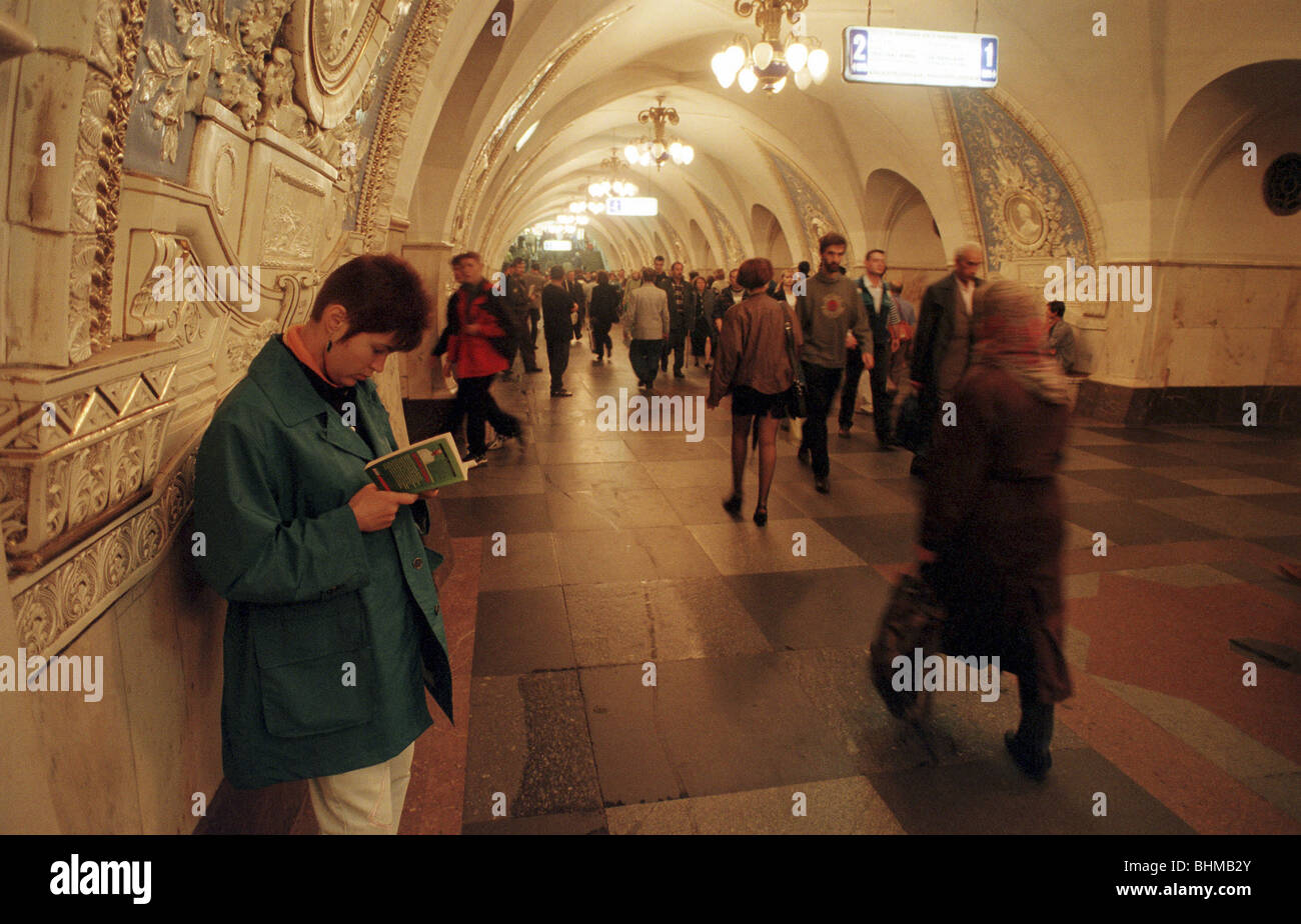 Woman reading a book on the Taganskaja station of the Moscow Metro ...