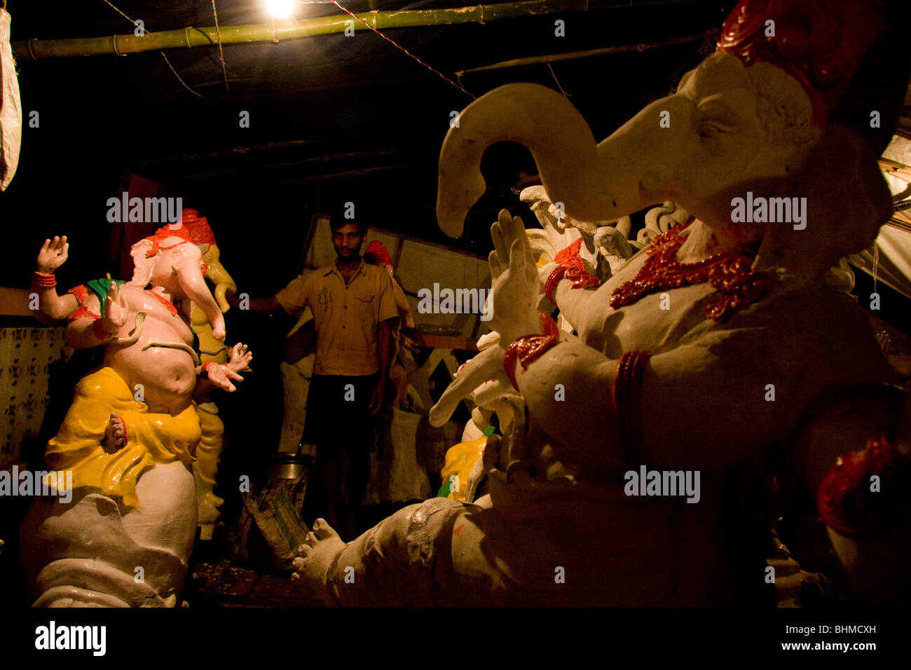 Statues of elephant god Ganesh are made from mud and hay for the ...
