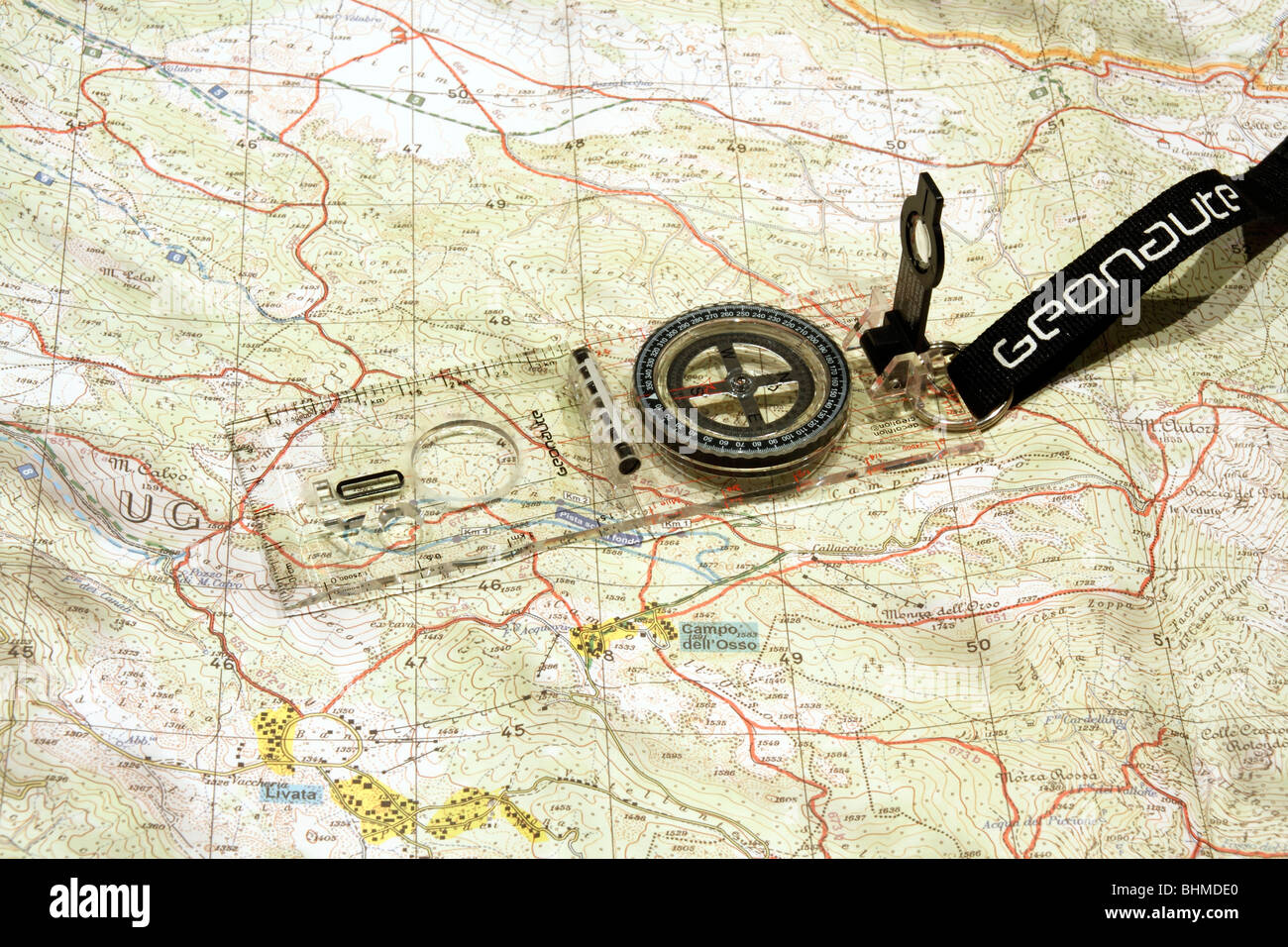 A compass on a road map Stock Photo - Alamy