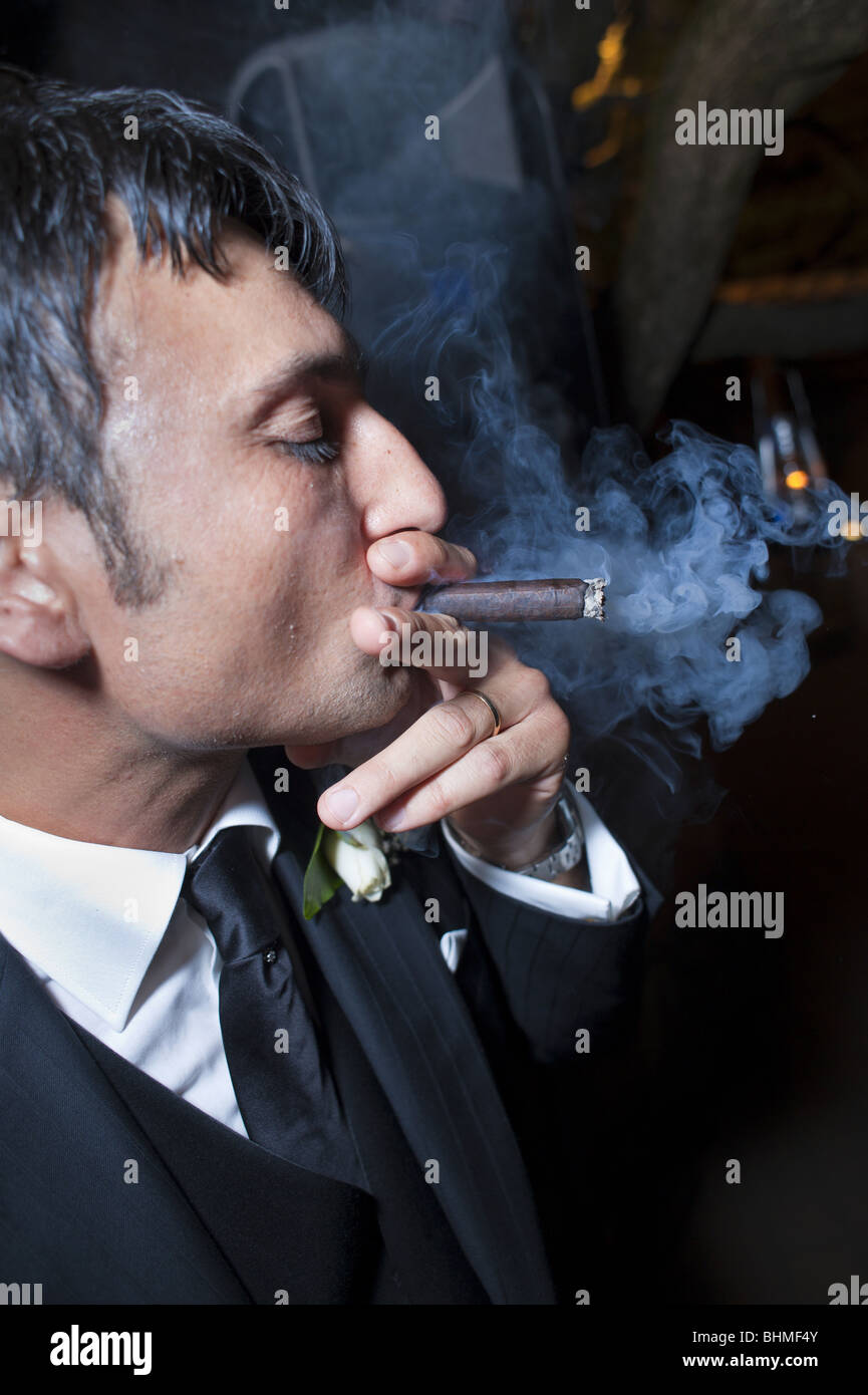 Cigar Smoke Stock Photos & Cigar Smoke Stock Images - Alamy