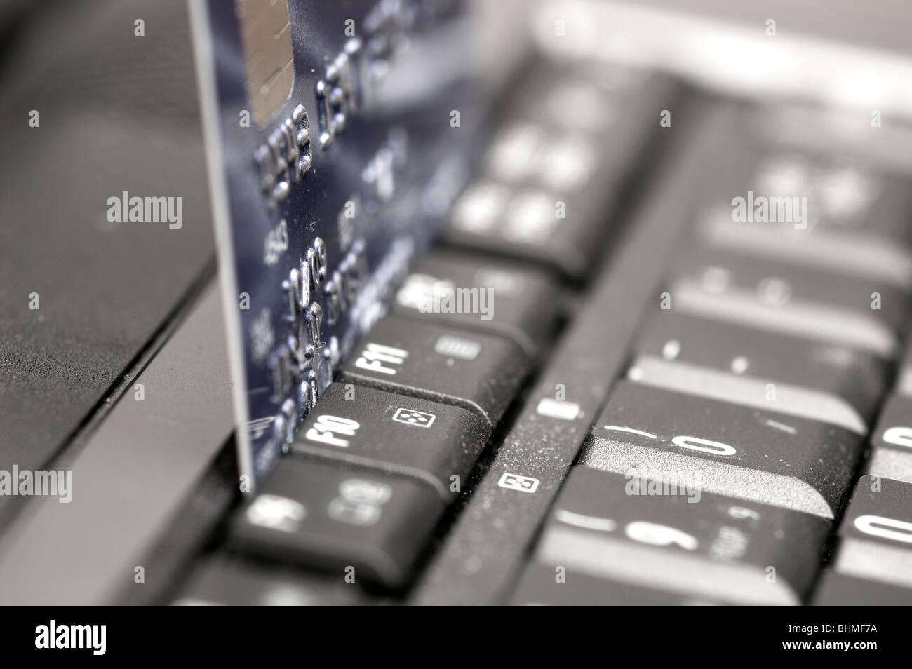 Credit card on computer keyboard Stock Photo - Alamy