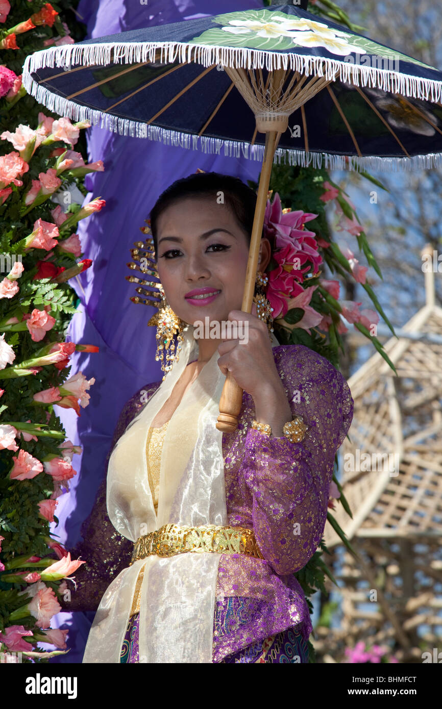 Flower display, Asian woman portrait floral art gaily decorated ...