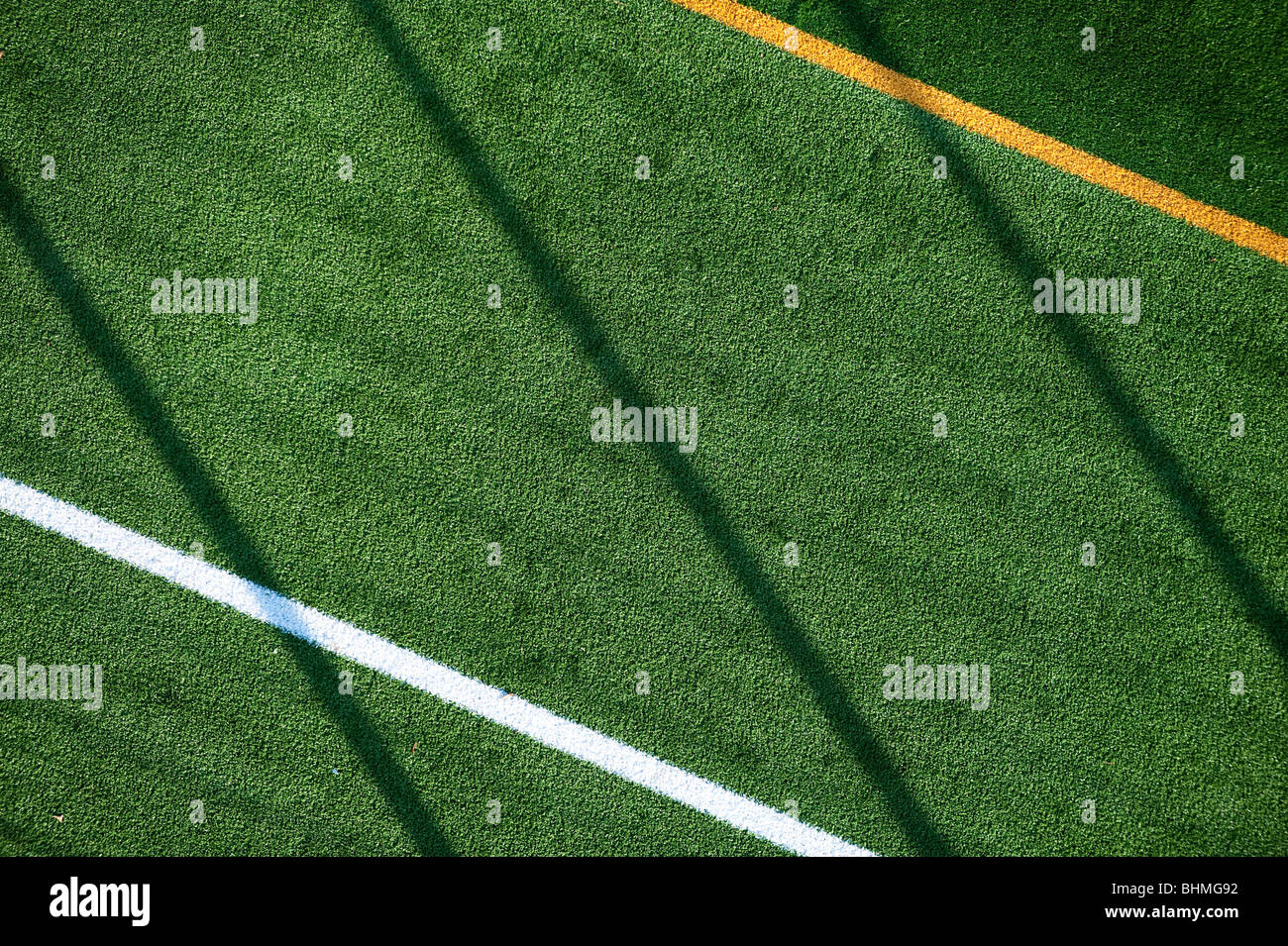 image of aerial view of green astroturf surface on sports playing field ...