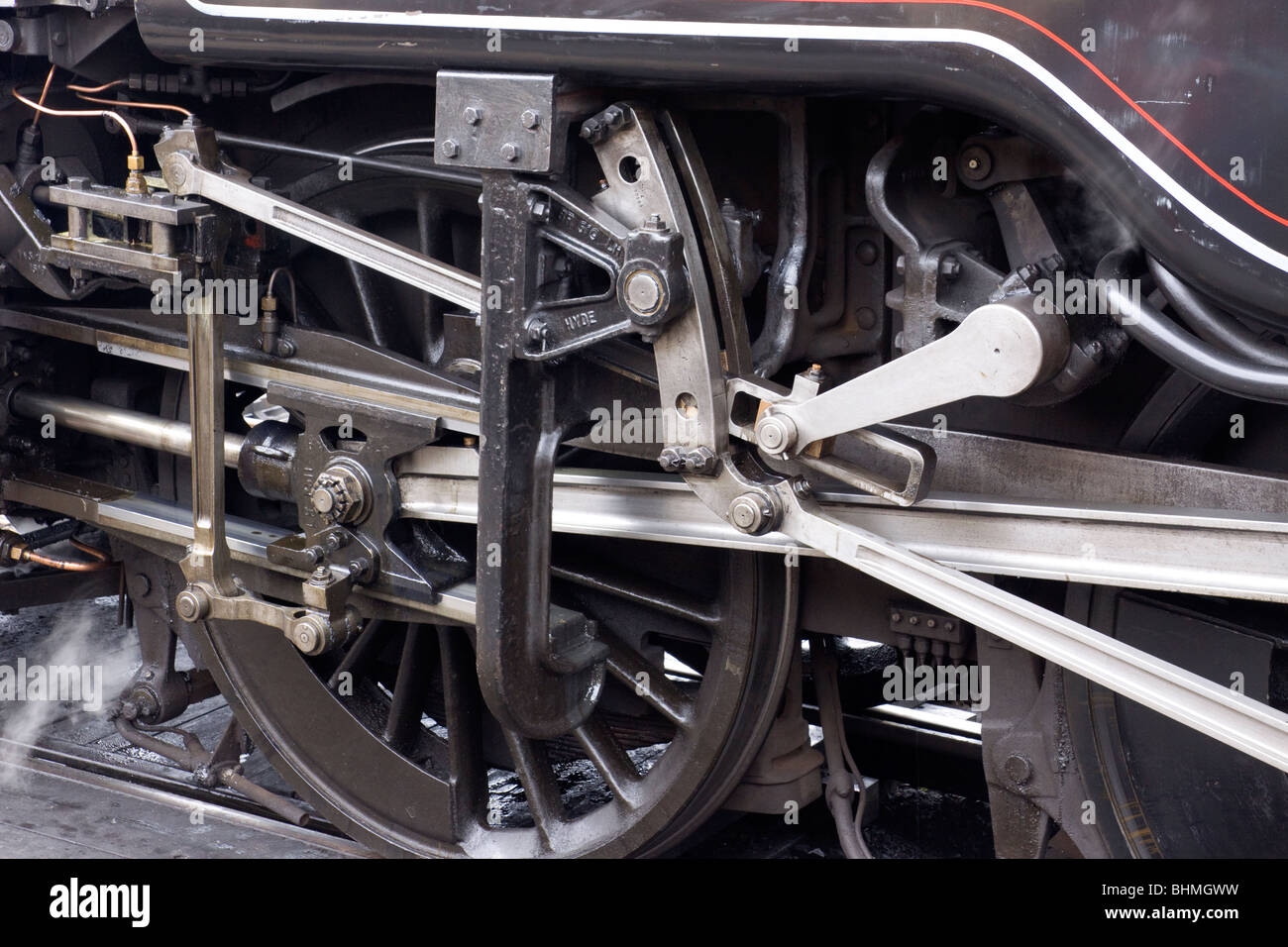 Close-up of a wheel assembly of a Steam Locomotive Stock Photo - Alamy