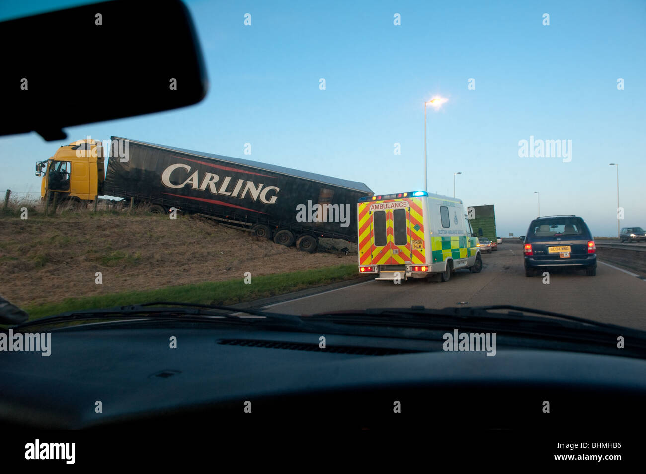 image of truck resting on embankment after losing control Stock Photo ...