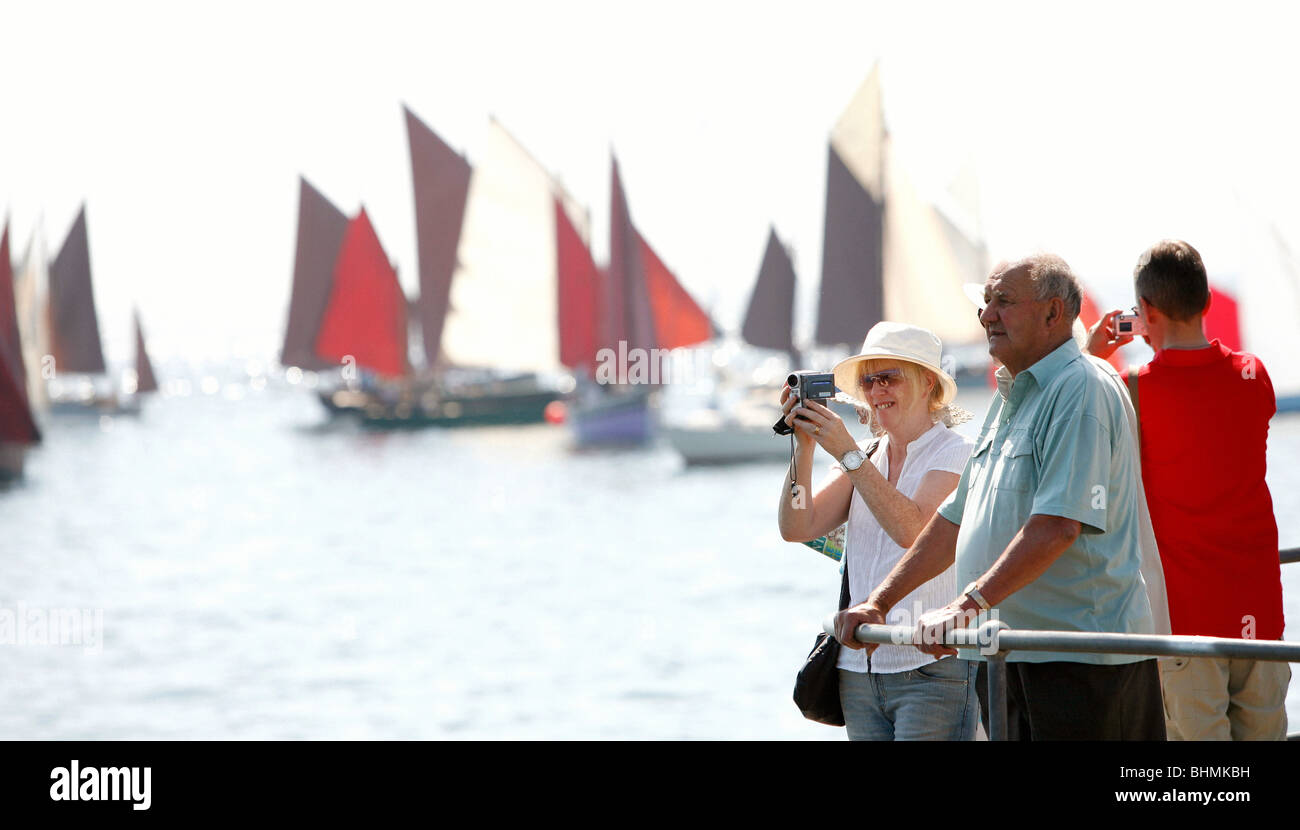 Traditional Cornish fishing boats sailing in the sea in Mousehole for ...