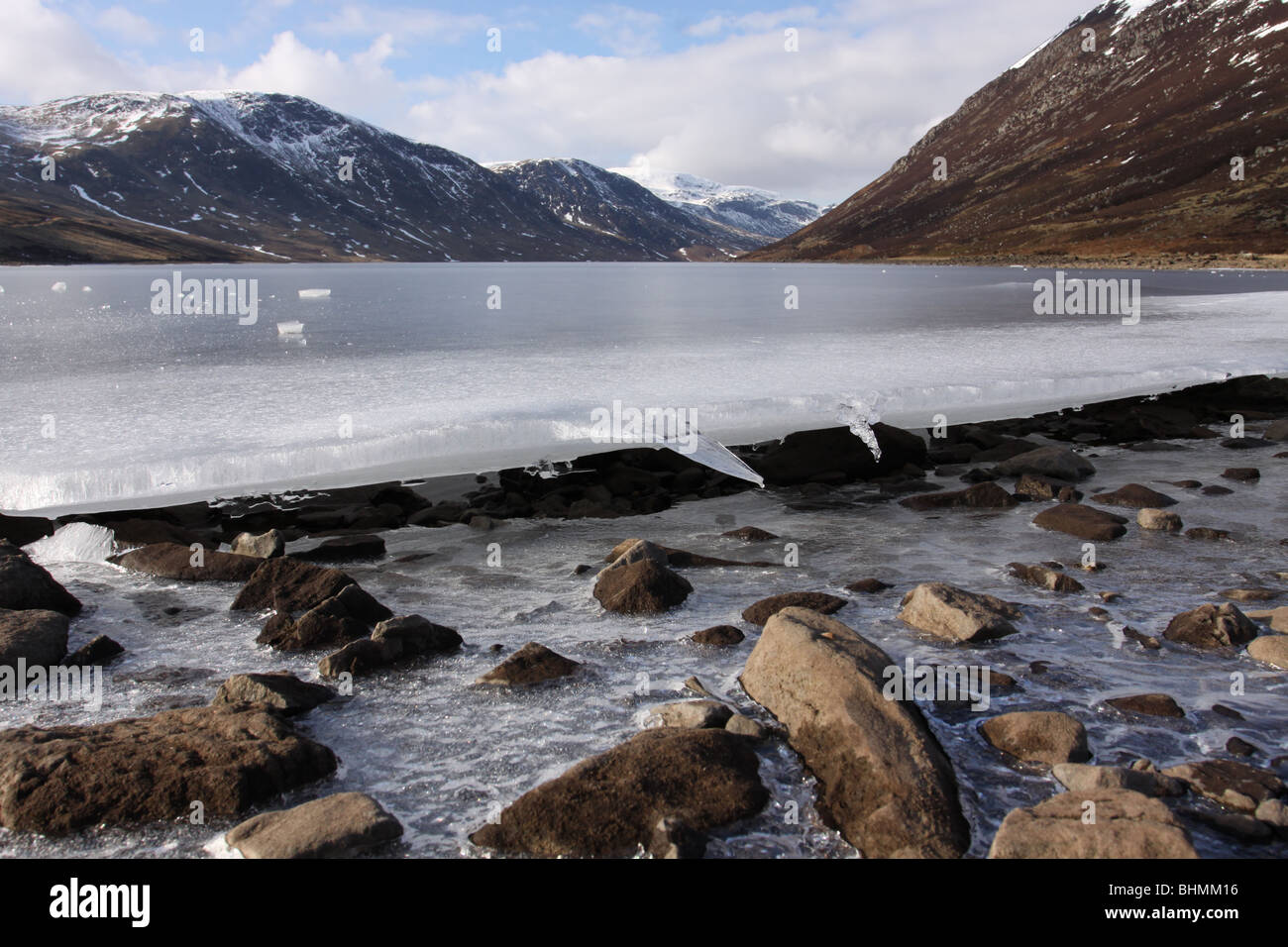 frozen surface of Loch Turret Reservoir Glen Turret Perthshire Scotland ...