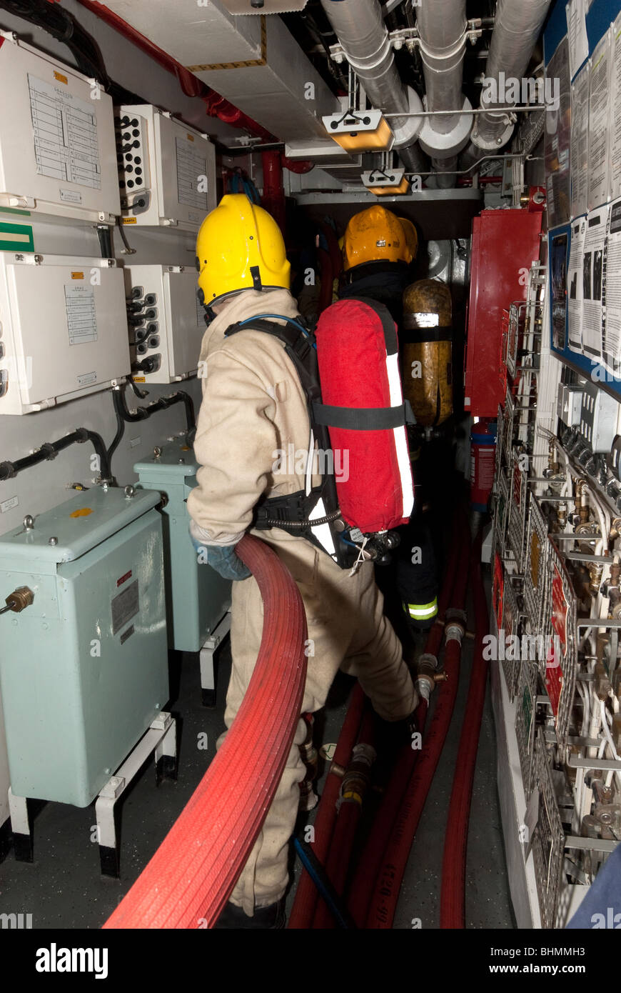 Ships crew tackling fire in hold of ship practice Stock Photo - Alamy