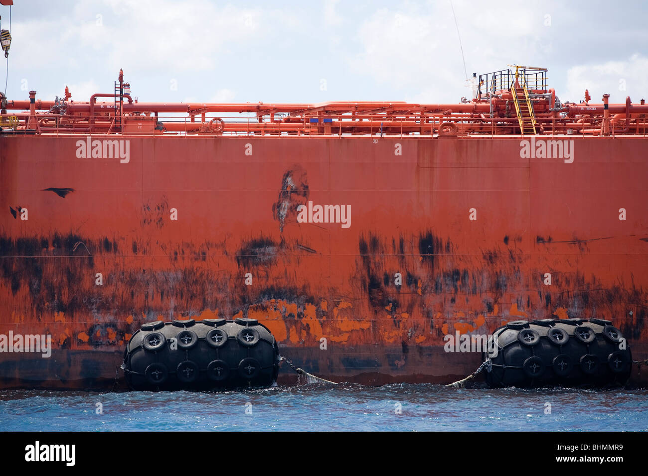 Giant fenders on the side of a fuel tanker Stock Photo - Alamy