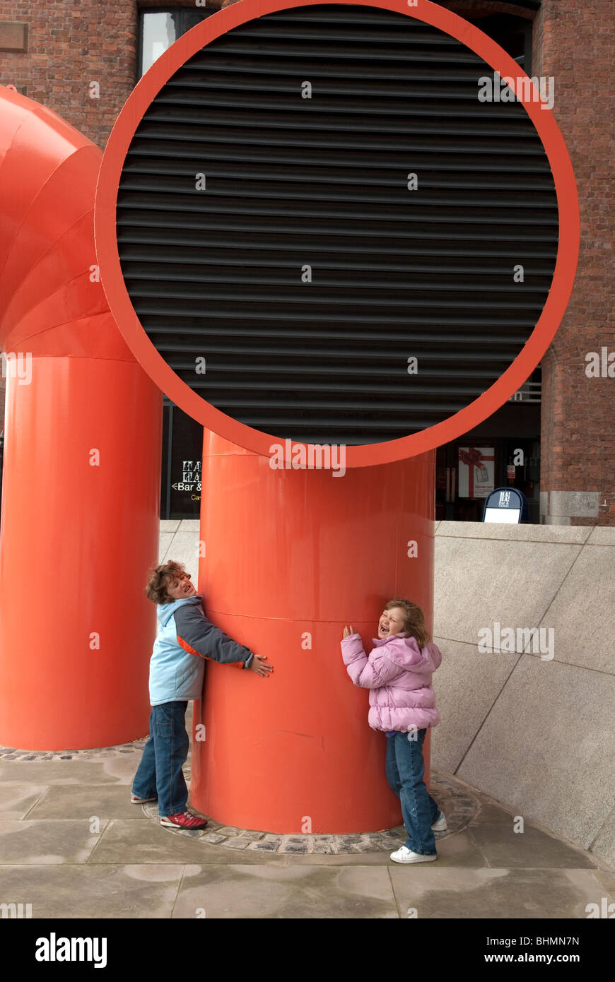 Boy & girl playing with huge old ships funnel FULLY MODEL RELEASED ...