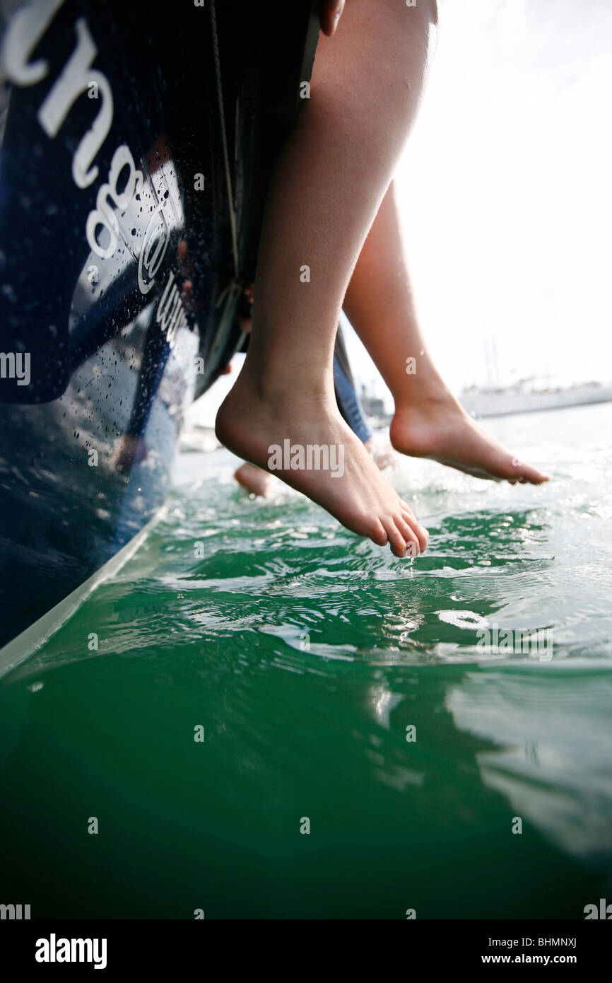 Feet in water Stock Photo - Alamy