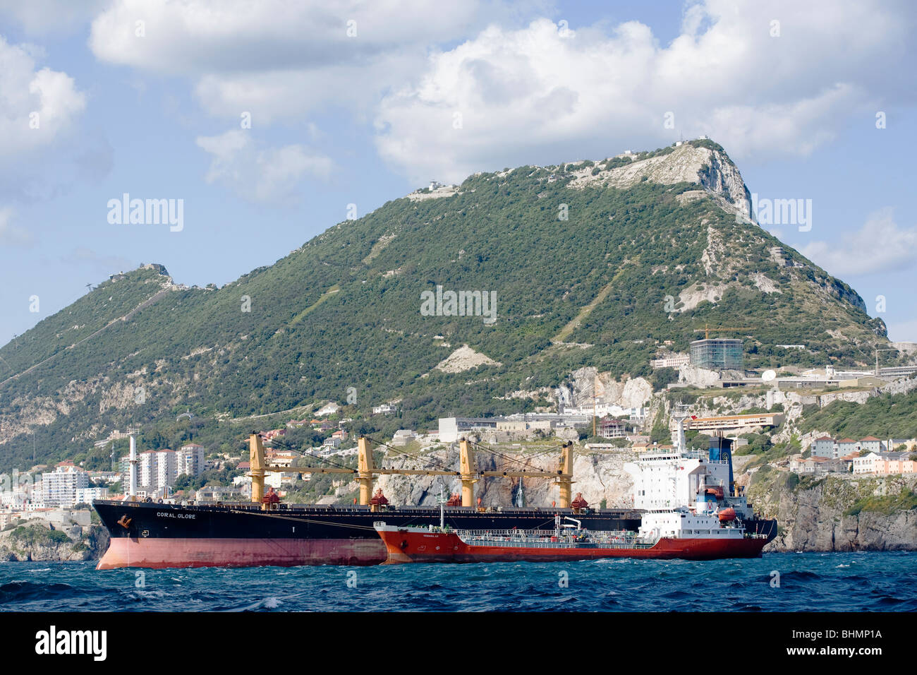A fuel ship bunkers fuel in the Bay of Gibraltar with the world famous ...