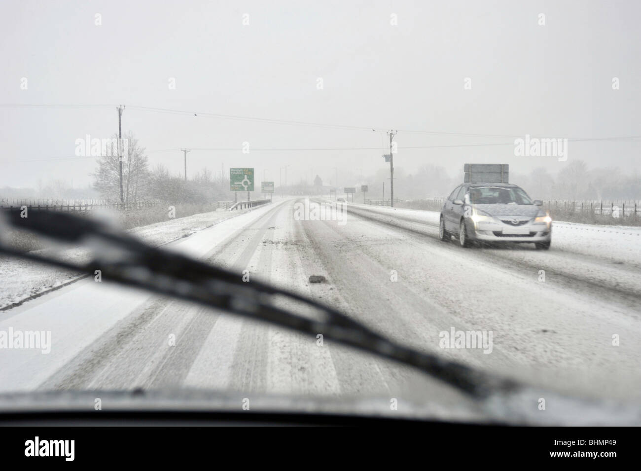 Driver's eye view of wintry driving conditions Stock Photo - Alamy