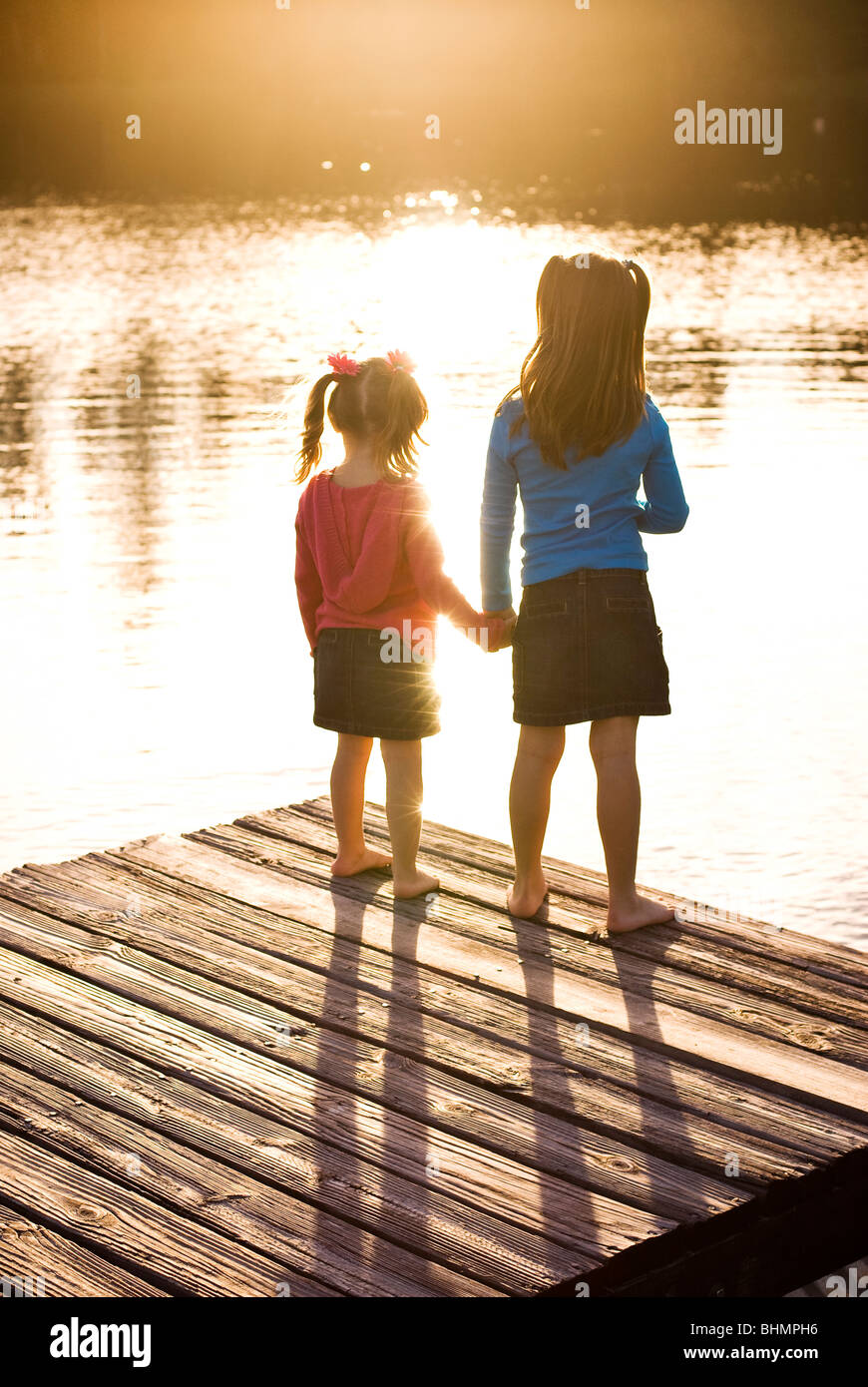 2 Sisters Holding Hands