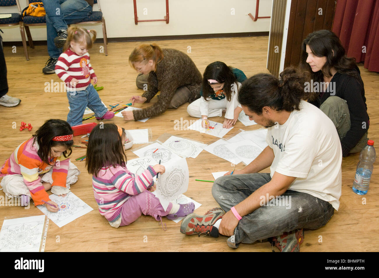 Group of children in an activity centre Stock Photo - Alamy