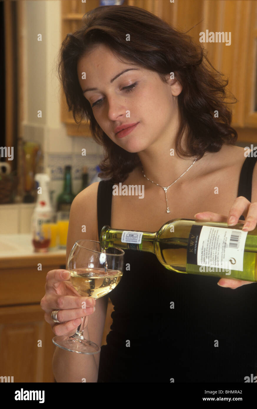 young woman drinking Stock Photo - Alamy