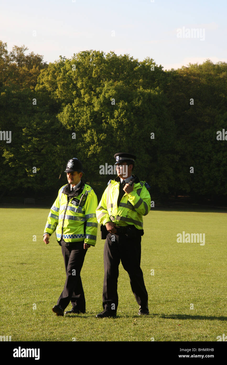 Police and PCSO on the beat in Highgate woods Stock Photo - Alamy