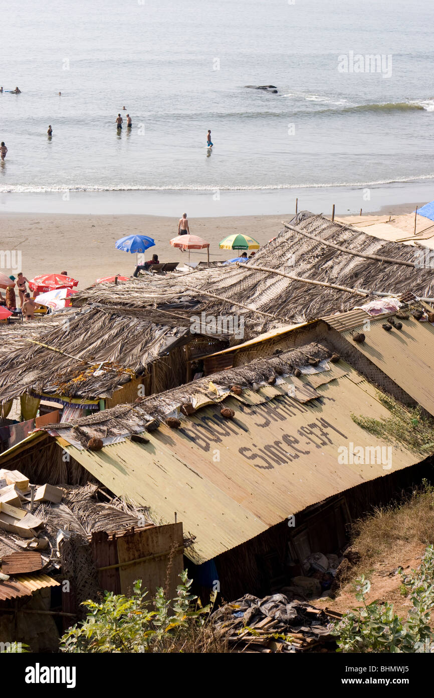 Overlooking palm tree shacks on the beach in Goa Stock Photo - Alamy