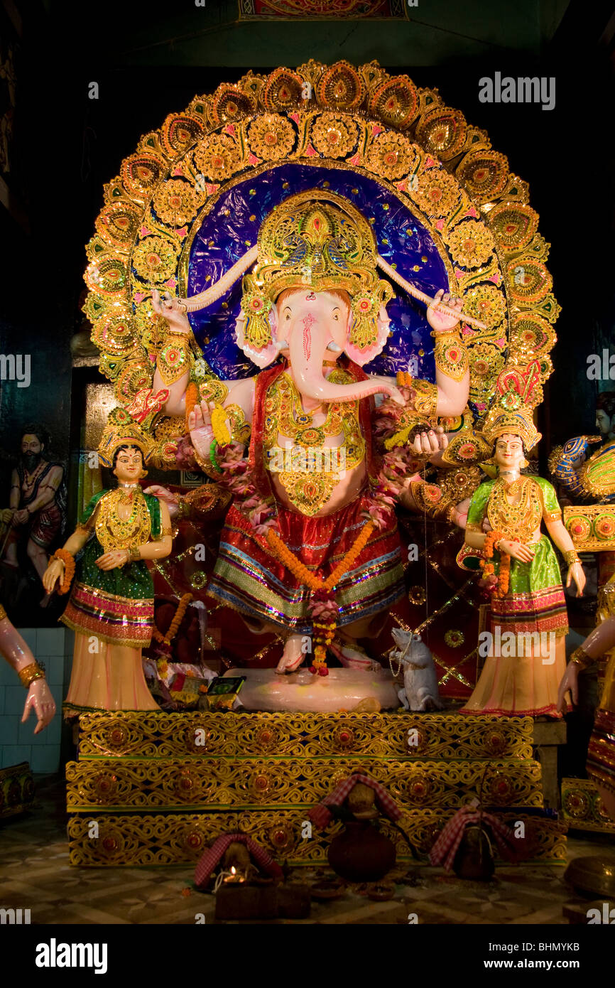 A statue of the Hindu elephant god Ganesh in a tented pavilion in Puri ...