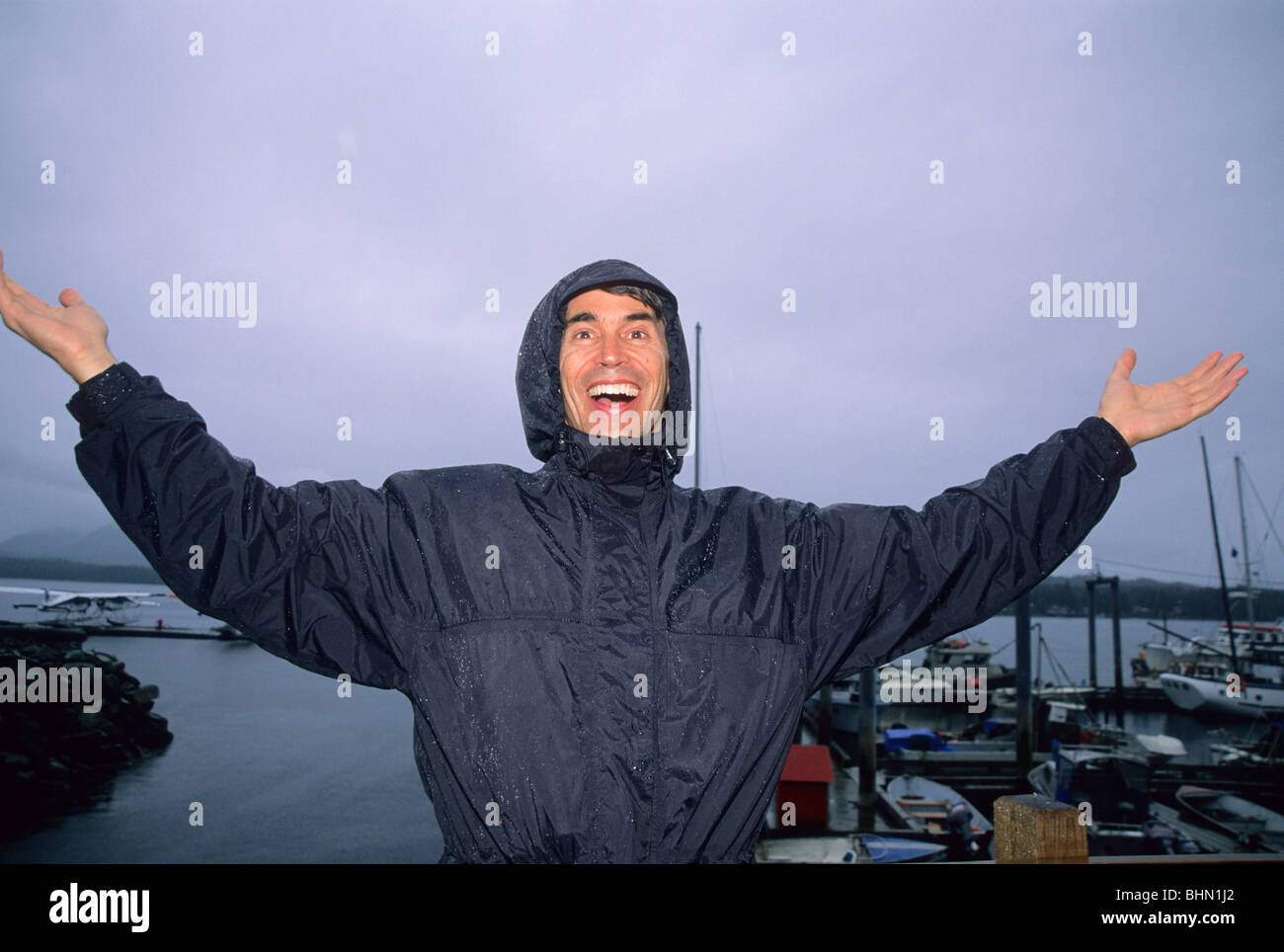 Man enjoying the rain Stock Photo - Alamy