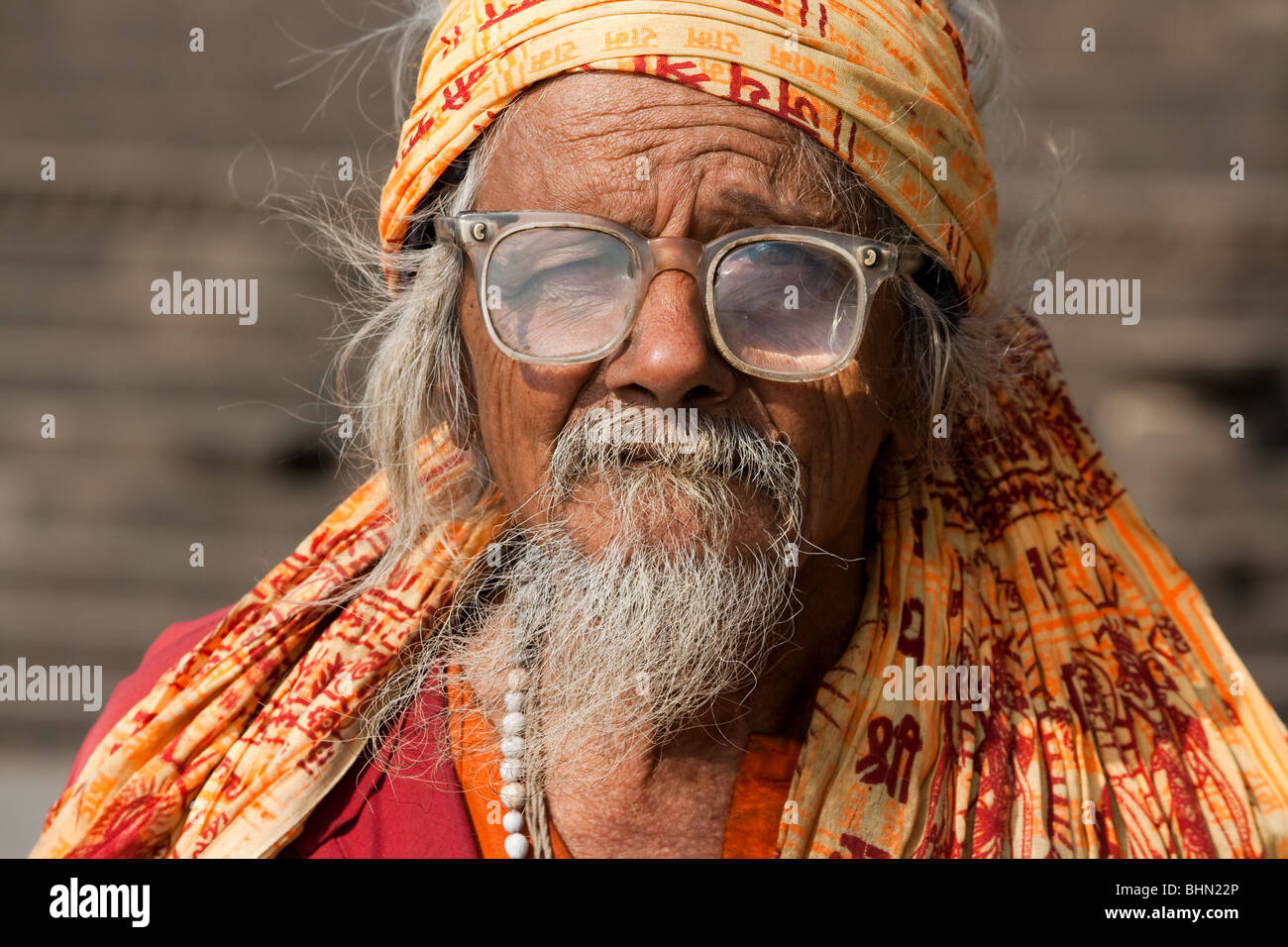 Portrait of a holy Man on the ghat of Narmada river at Maheshwar India ...