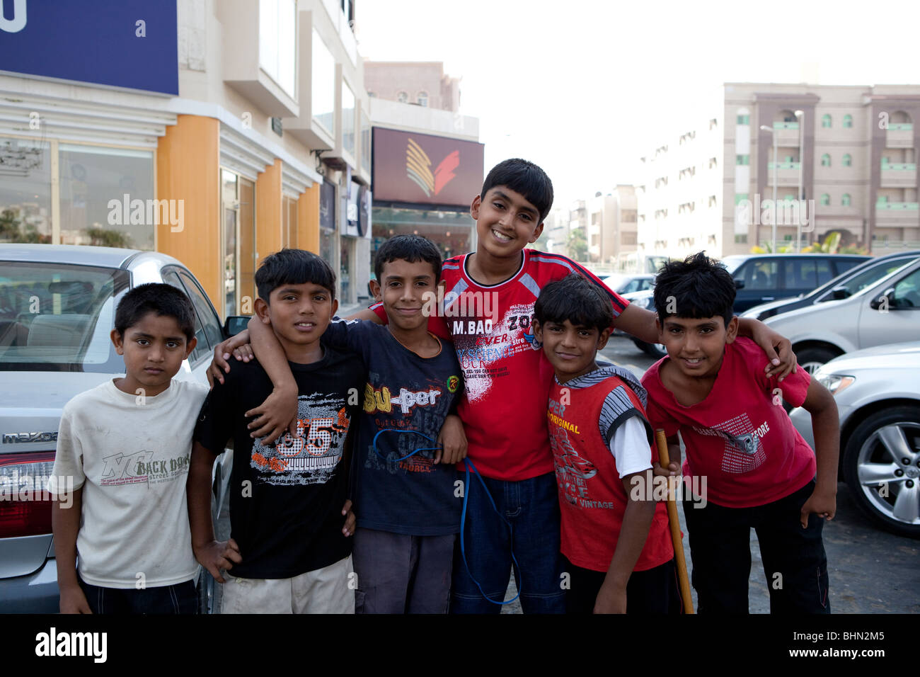 Boys street Jeddah Saudi Arabia fun children youth Stock Photo - Alamy