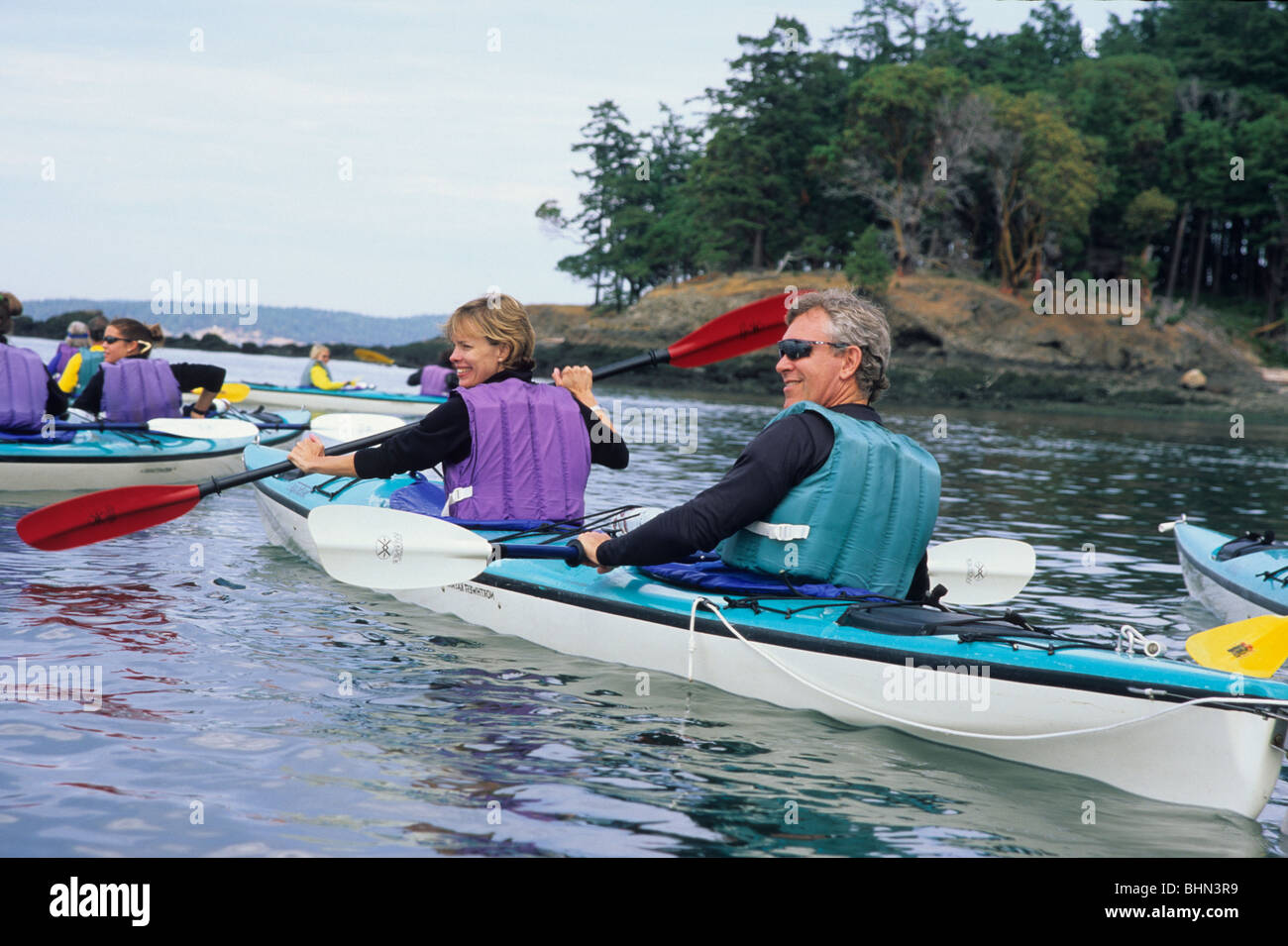 People kayaking in ocean Stock Photo - Alamy