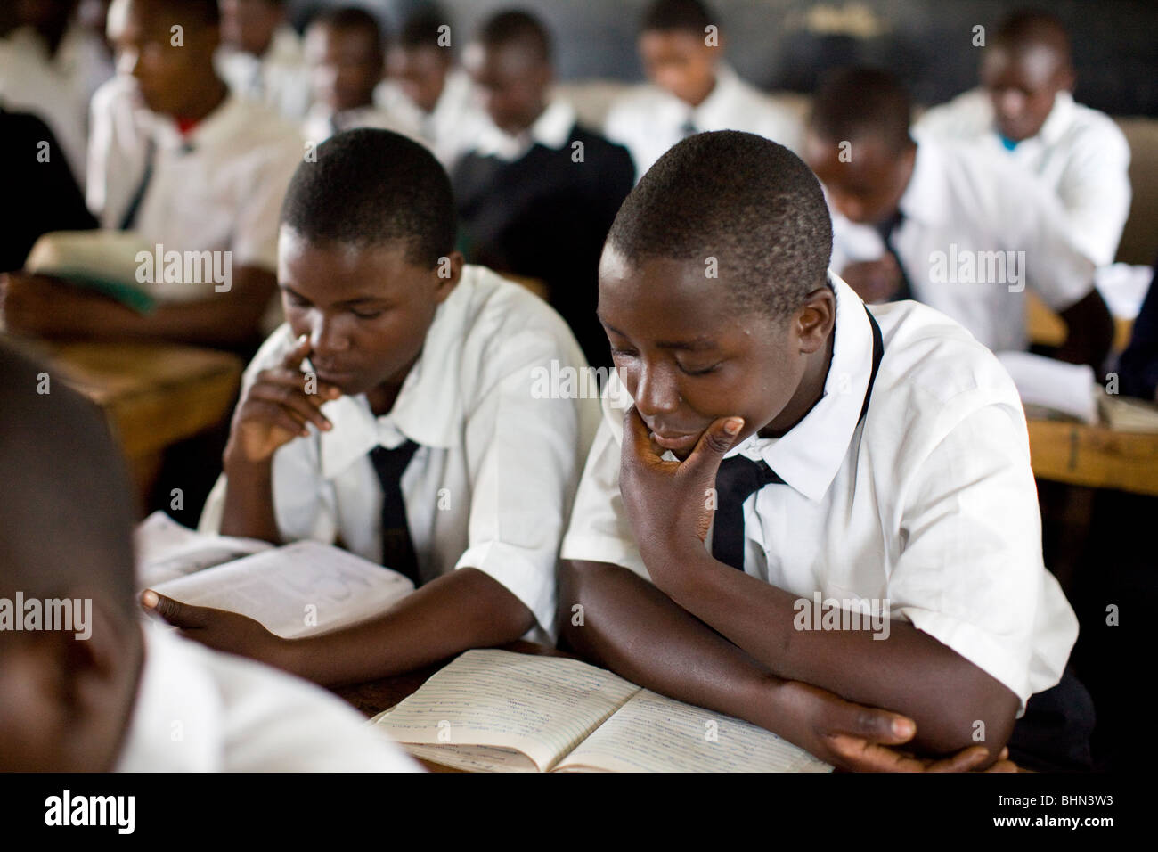 Teenage students studying in school in Western Kenya, near the Kakamega ...