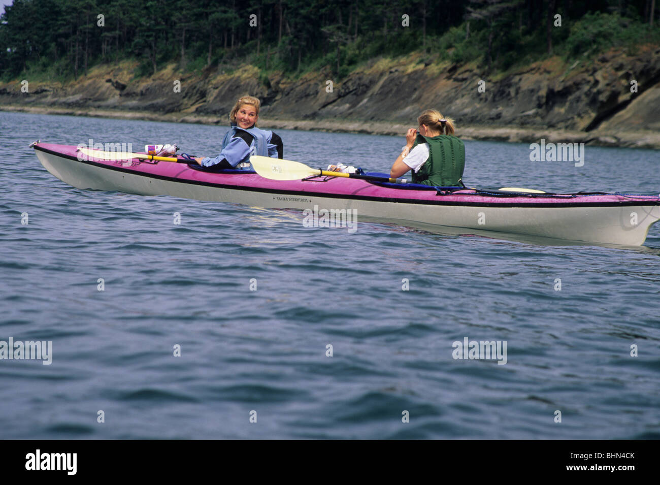 People kayaking in ocean Stock Photo - Alamy