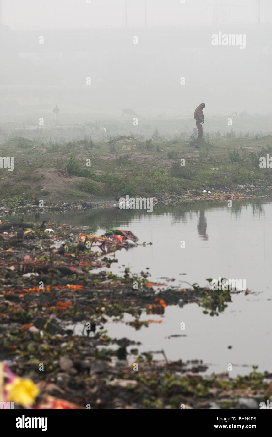 Local man conducts his morning ablutions at Yamuna River Delhi.Every ...