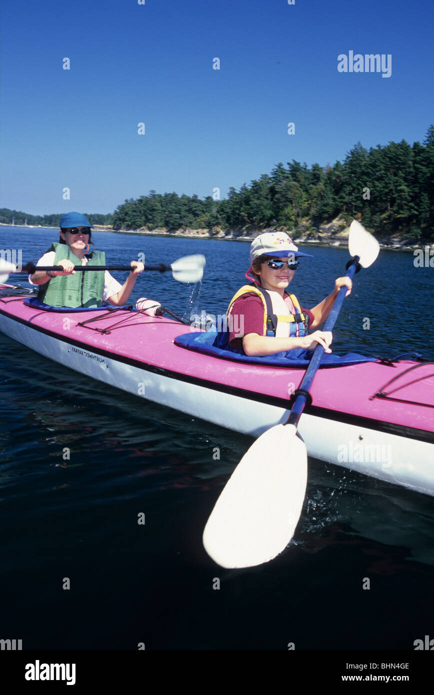 People kayaking in ocean Stock Photo - Alamy