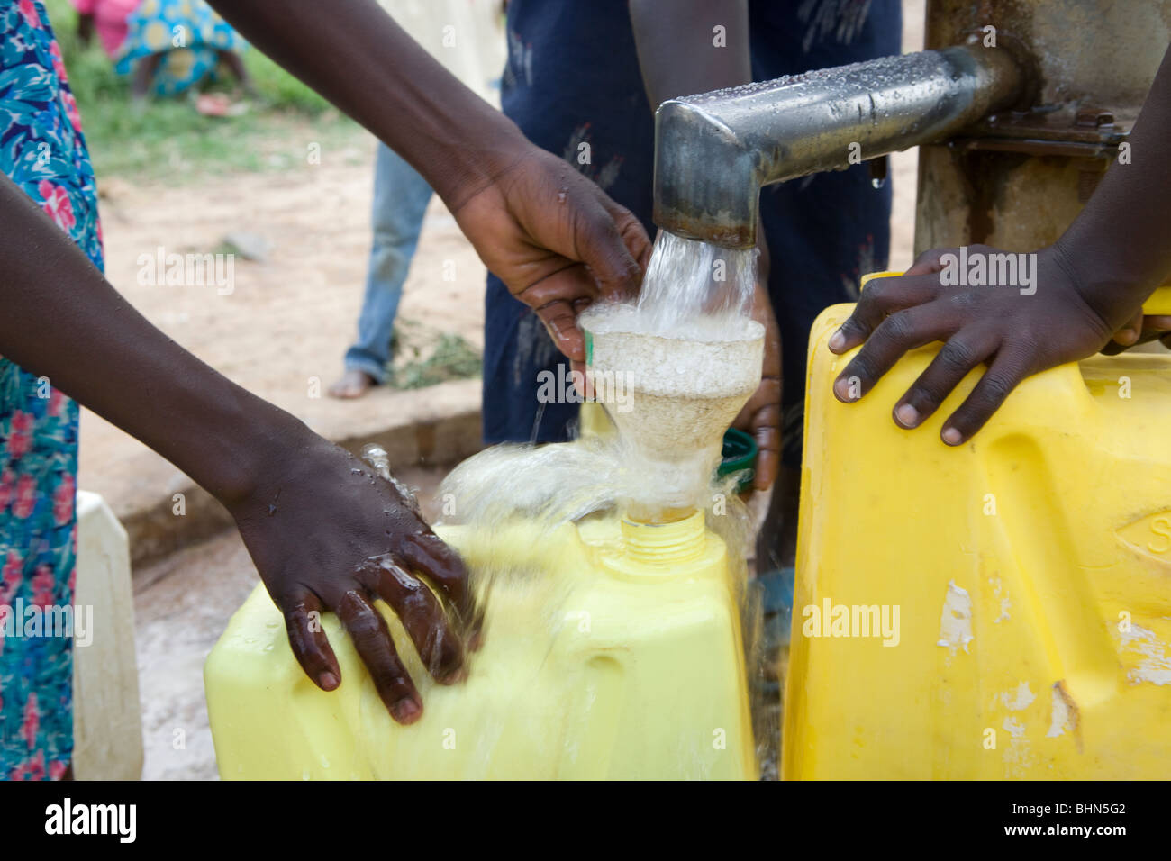 Children fetch fresh drinking water at a borehole in Amuria District ...