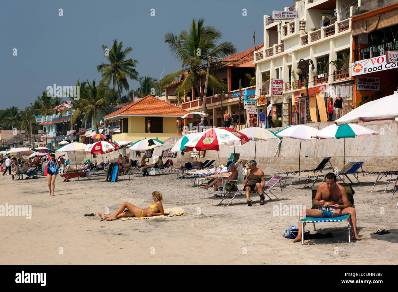 India, Kerala, Kovalam, Lighthouse (Adam) Beach, sunbathers Stock Photo ...