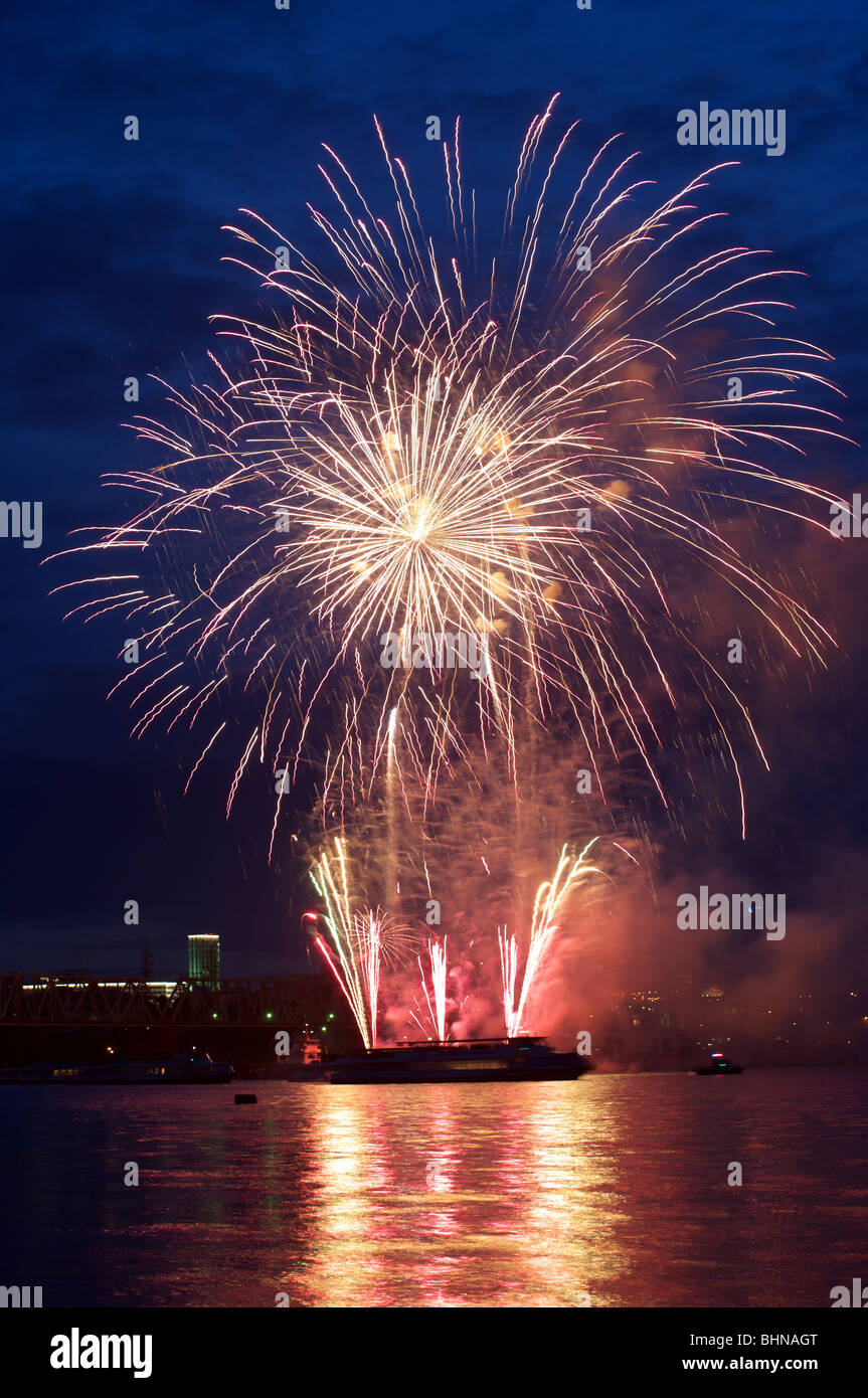 Spectacular display of firework over water Stock Photo - Alamy