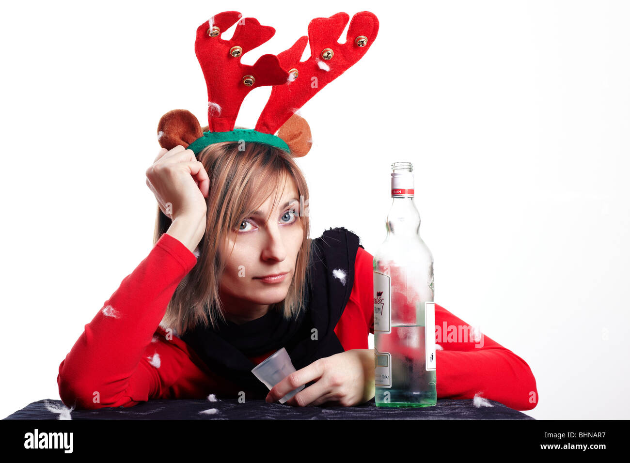 Drinking woman during Christmas Stock Photo - Alamy
