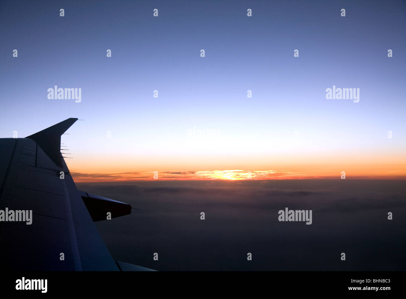 Clouds and sunset by an airplane hi-res stock photography and images ...
